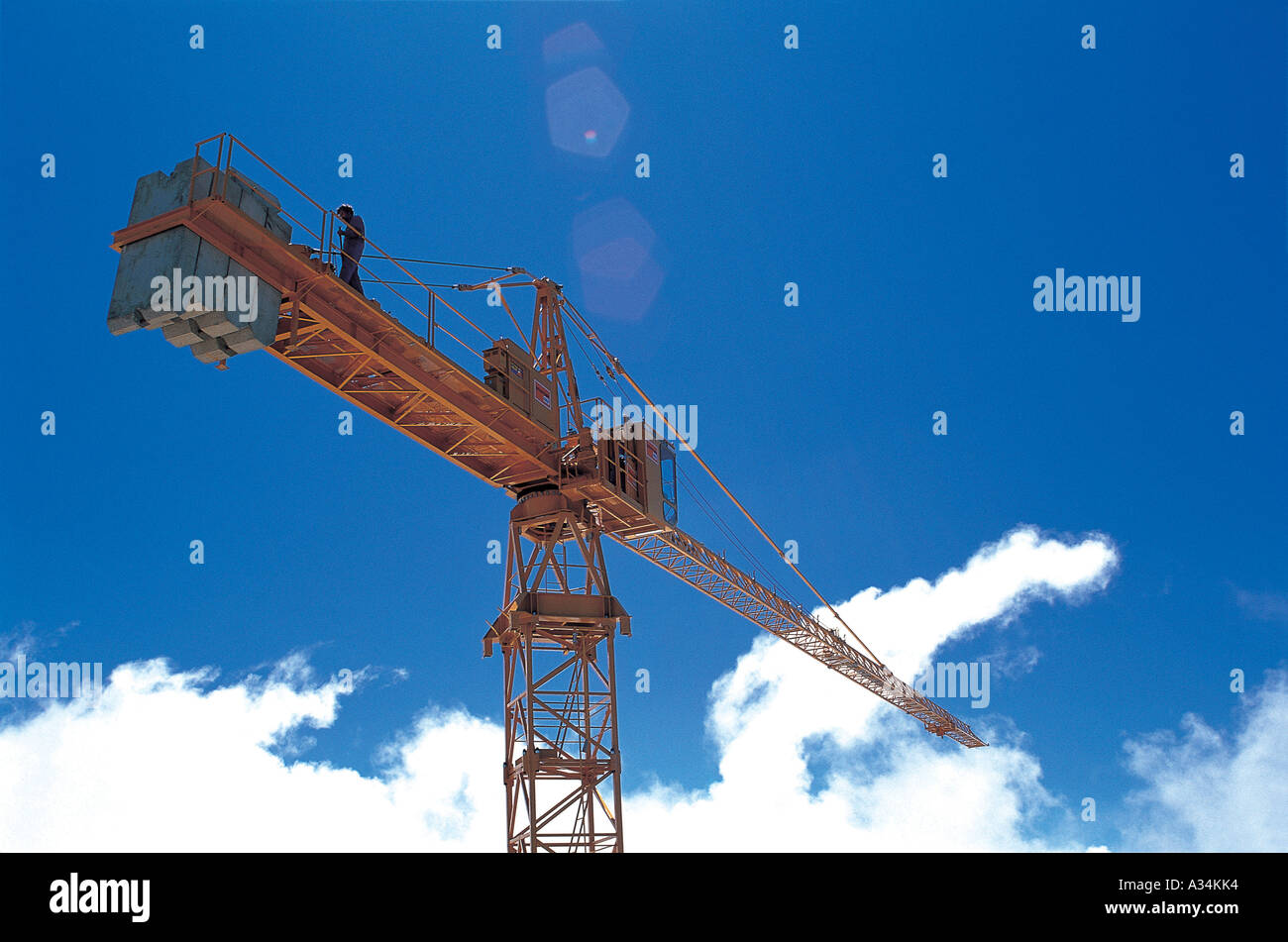 A closed view on the tower crane from behind Stock Photo - Alamy