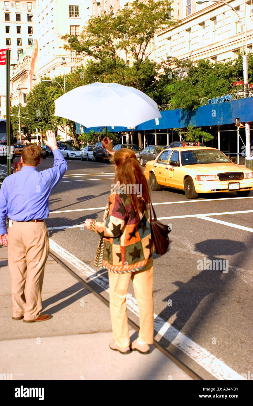 asking for a cab in new york Stock Photo - Alamy