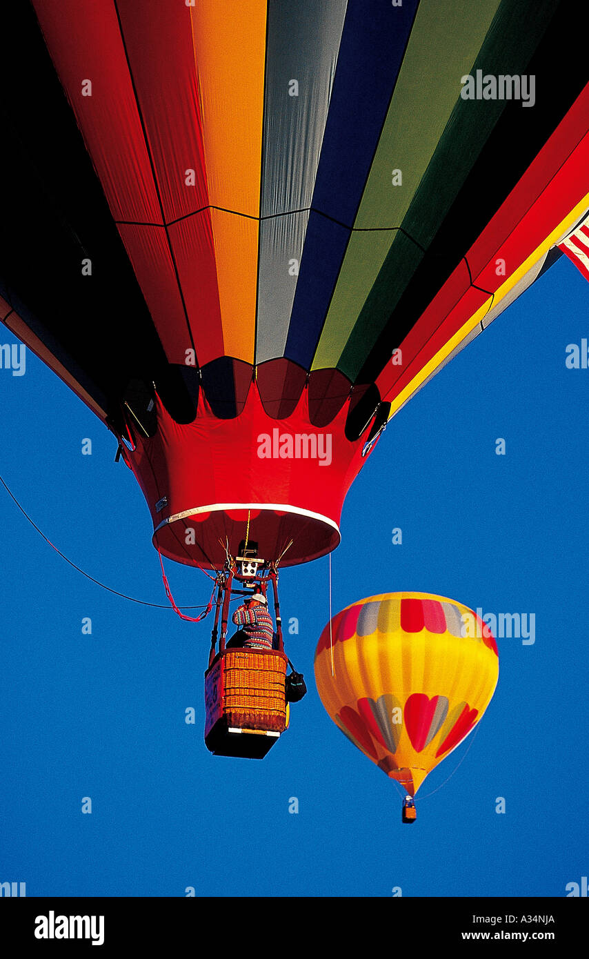 Two colorful hot air balloons floating in the air side by side Stock ...