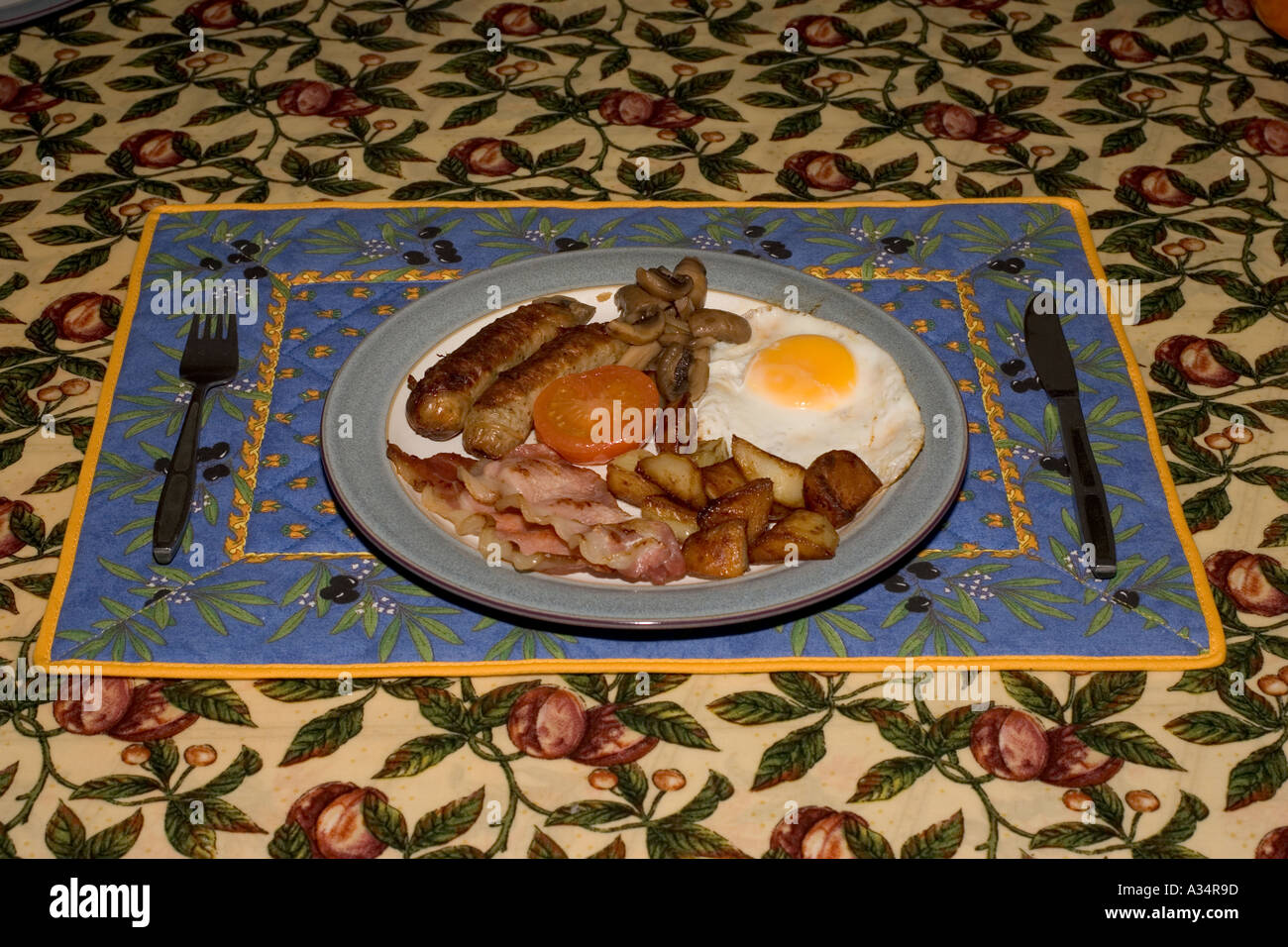 Big English cooked breakfast ready to eat bacon sausages eggs tomato ...