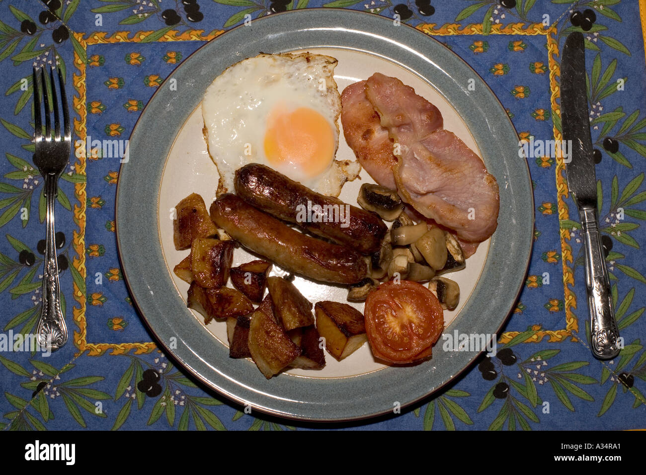 Big English cooked breakfast ready to eat bacon sausages eggs tomato ...