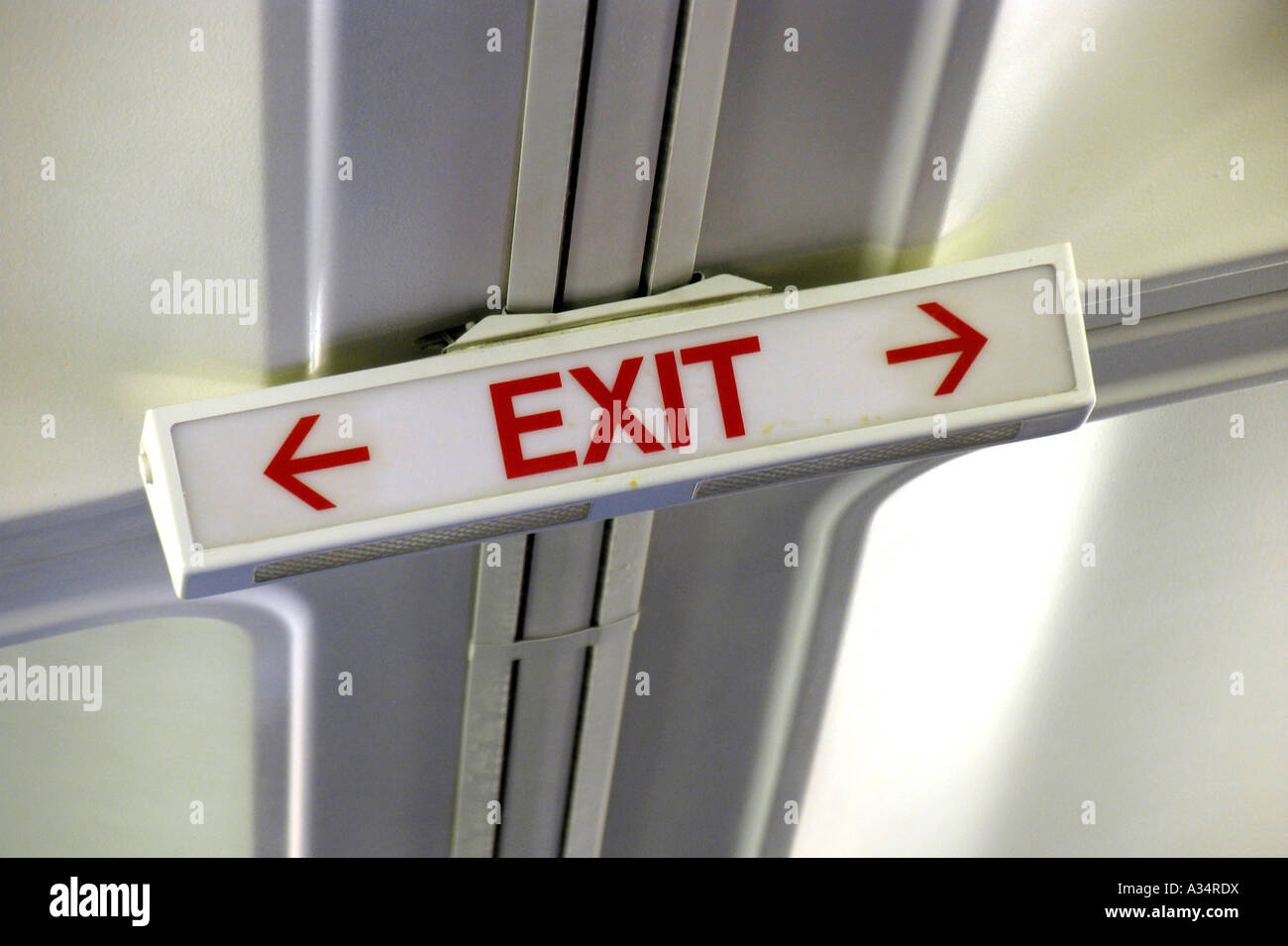 Exit Zeichenin einem Flugzeug, exit symbol inside airplane Stock Photo ...