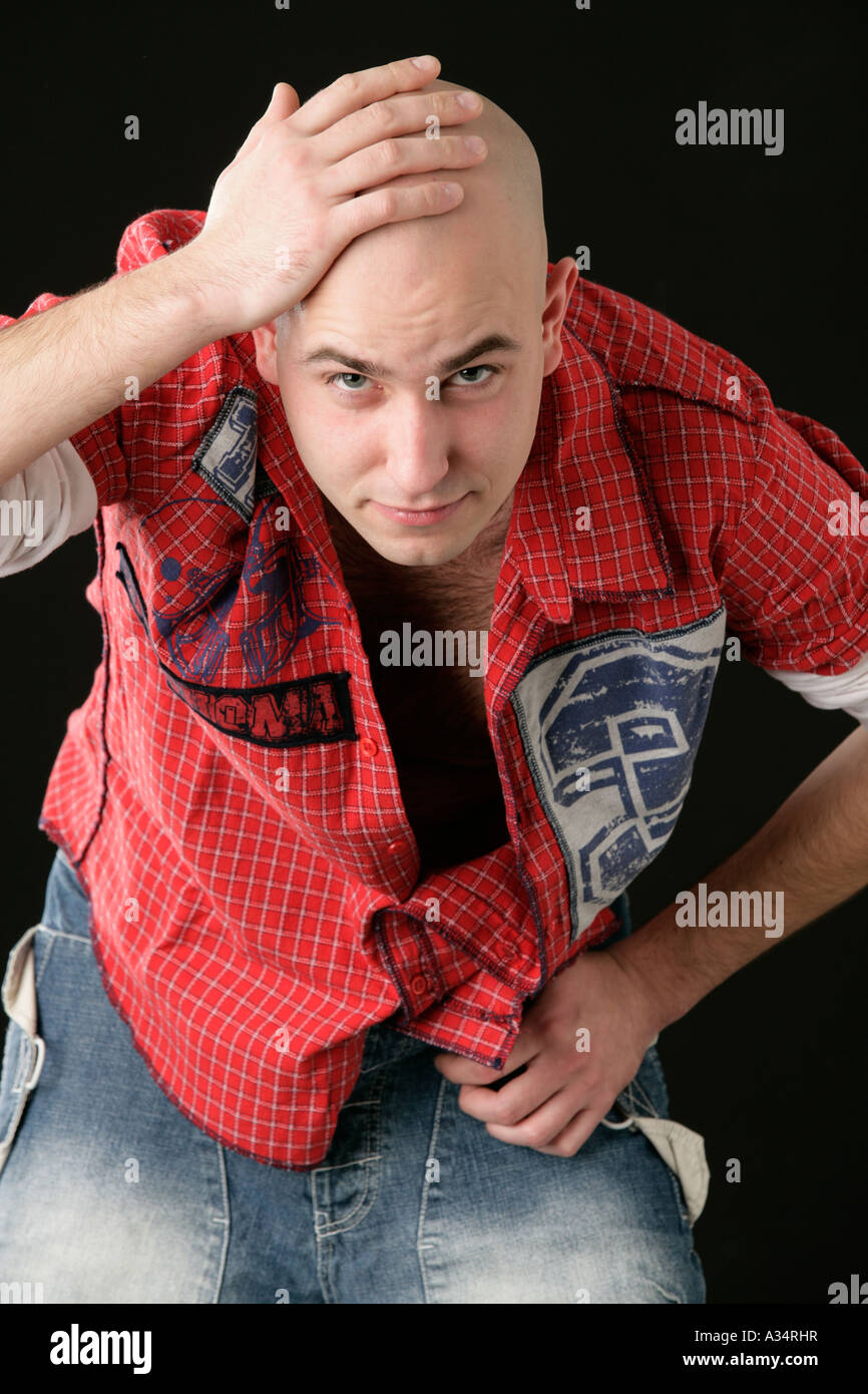 Man touching his head Stock Photo - Alamy