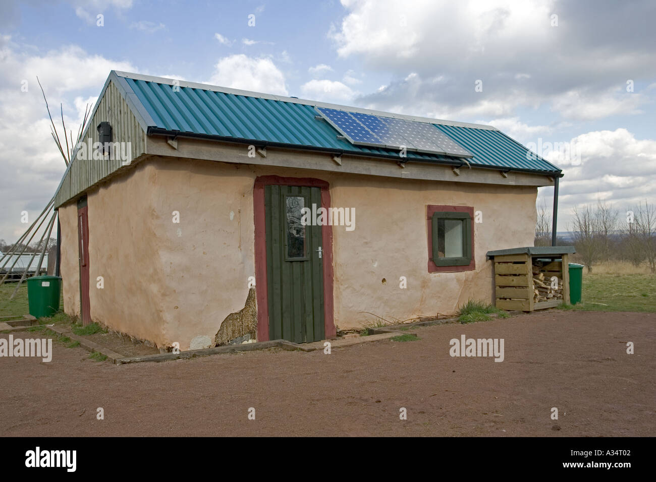 House made of straw bales with solar collectors on roof Bishopswood ...