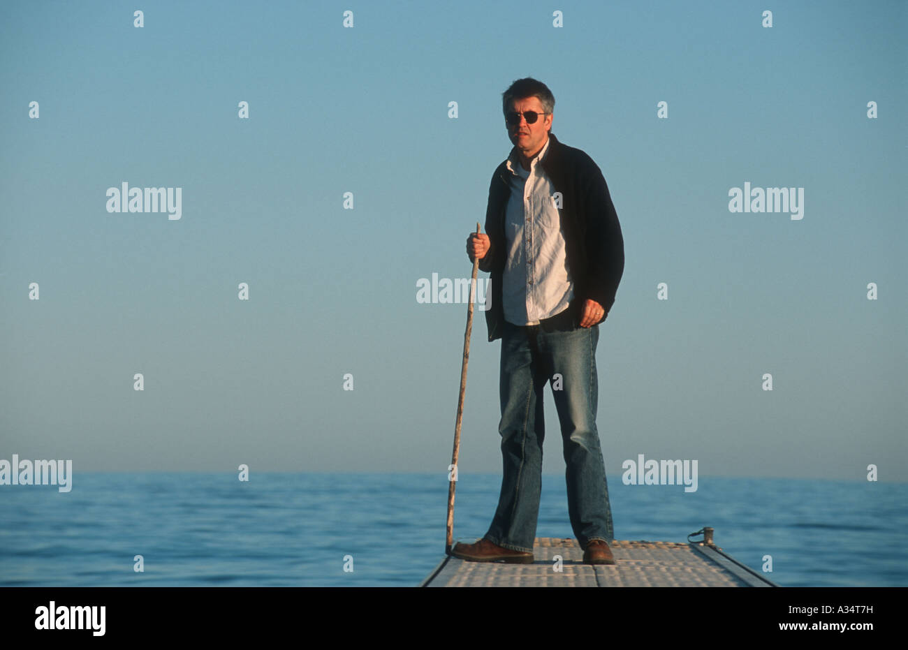 Man on jetty, St.Topez, France Stock Photo - Alamy