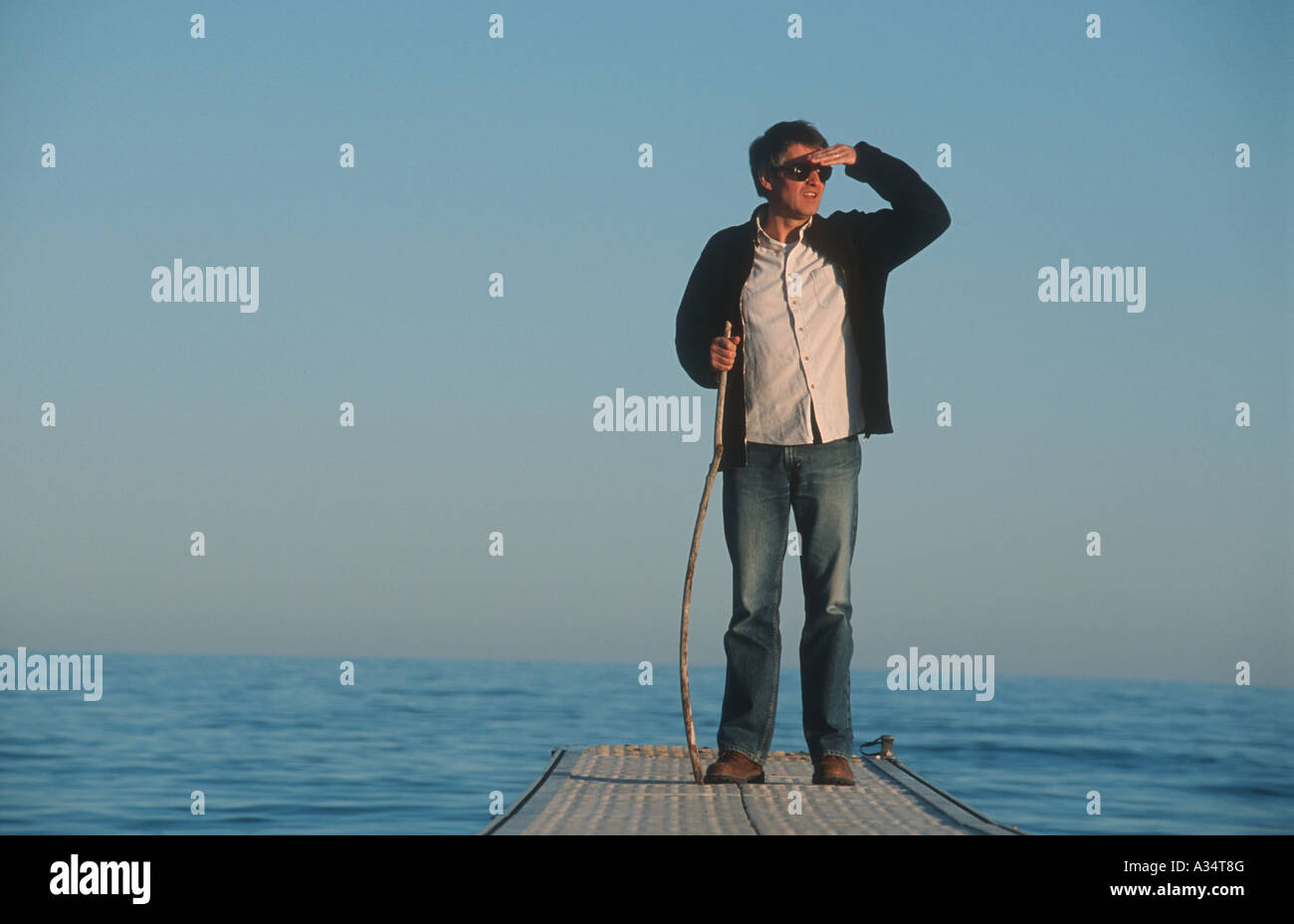 Man on jetty, St.Topez, France Stock Photo - Alamy