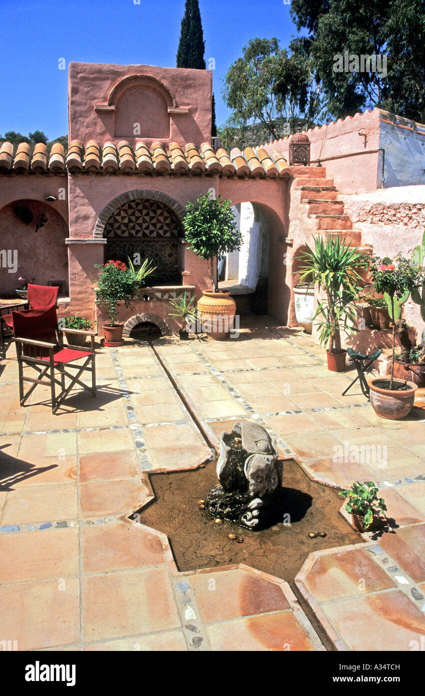A detail of a delightful higher level Spanish patio garden at the Finca ...