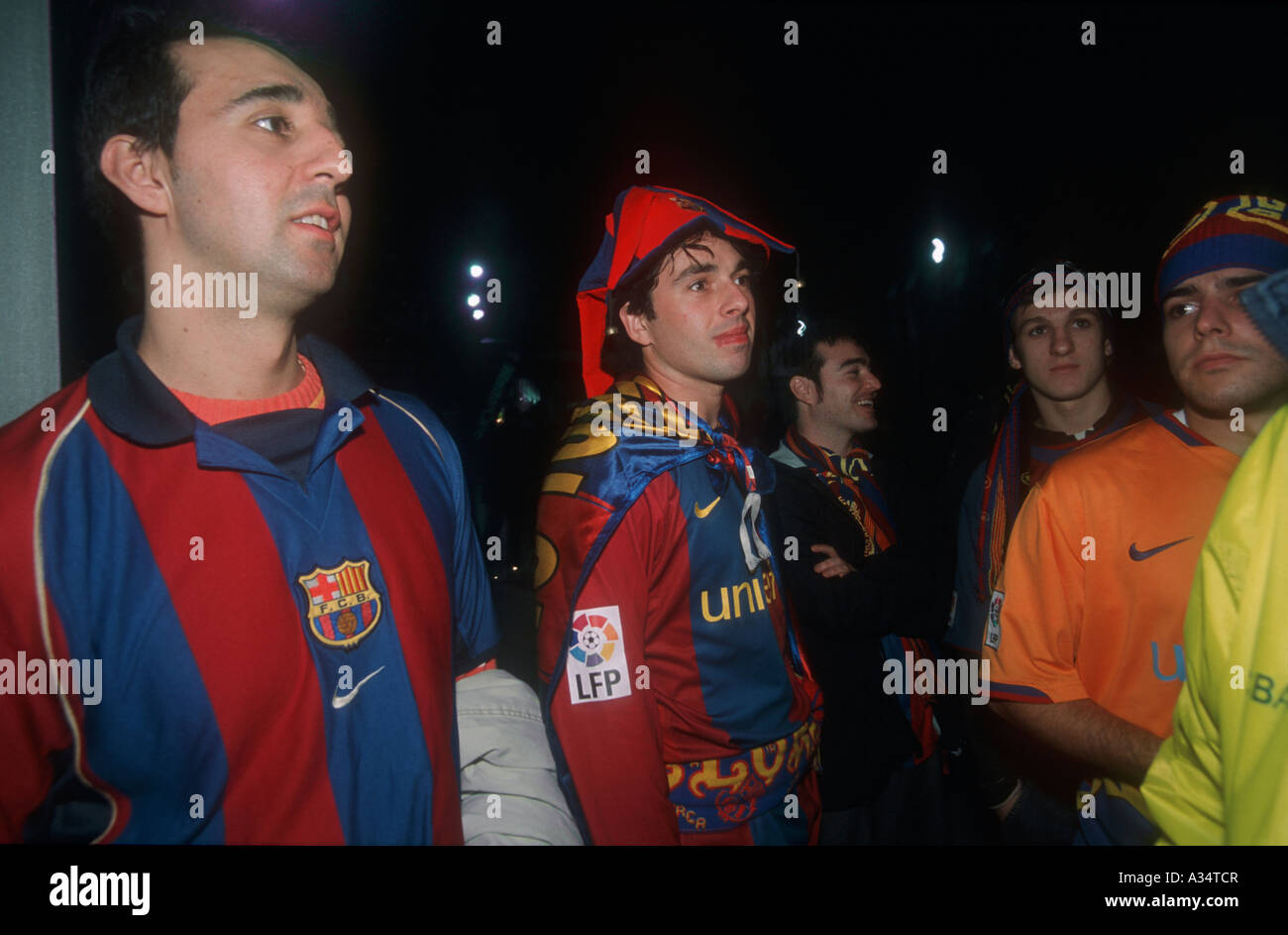 Tired Barça fans shortly before entering El Camp Nou, Barcelona Stock ...