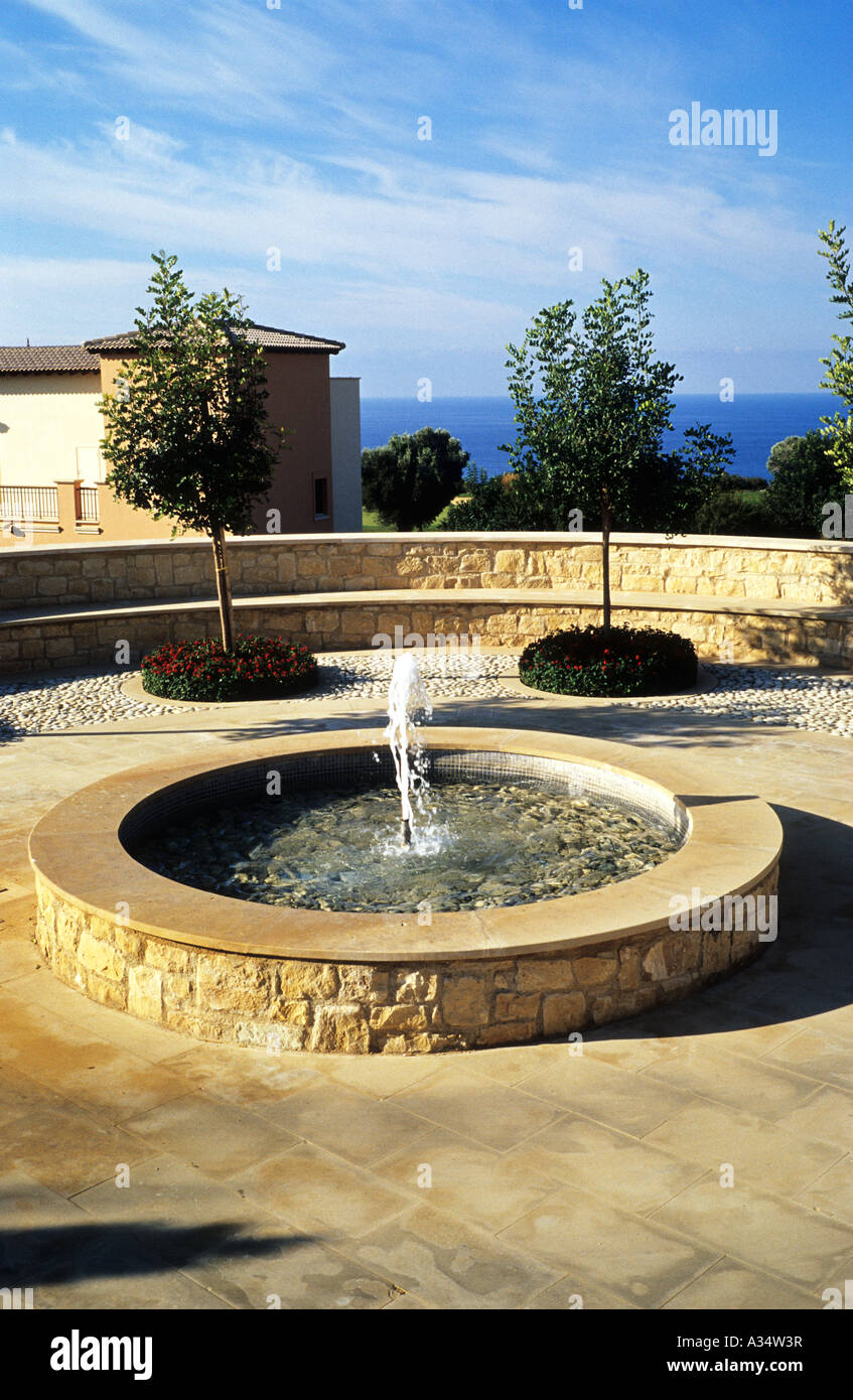 A small circular ornamental pool which is part of the urban landscaping ...