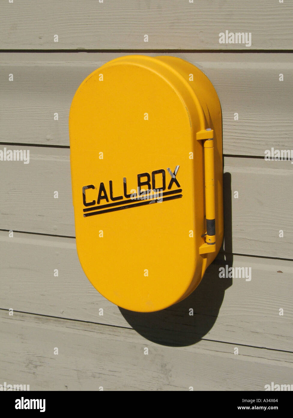 An 911 emergency call box is located on the front of a firehouse Stock ...