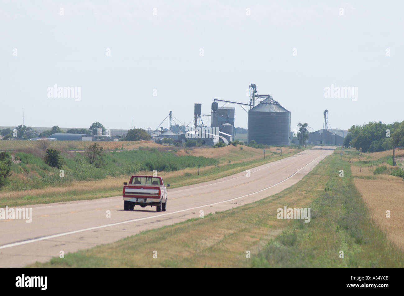 Pick up truck on the road to the farm Stock Photo - Alamy