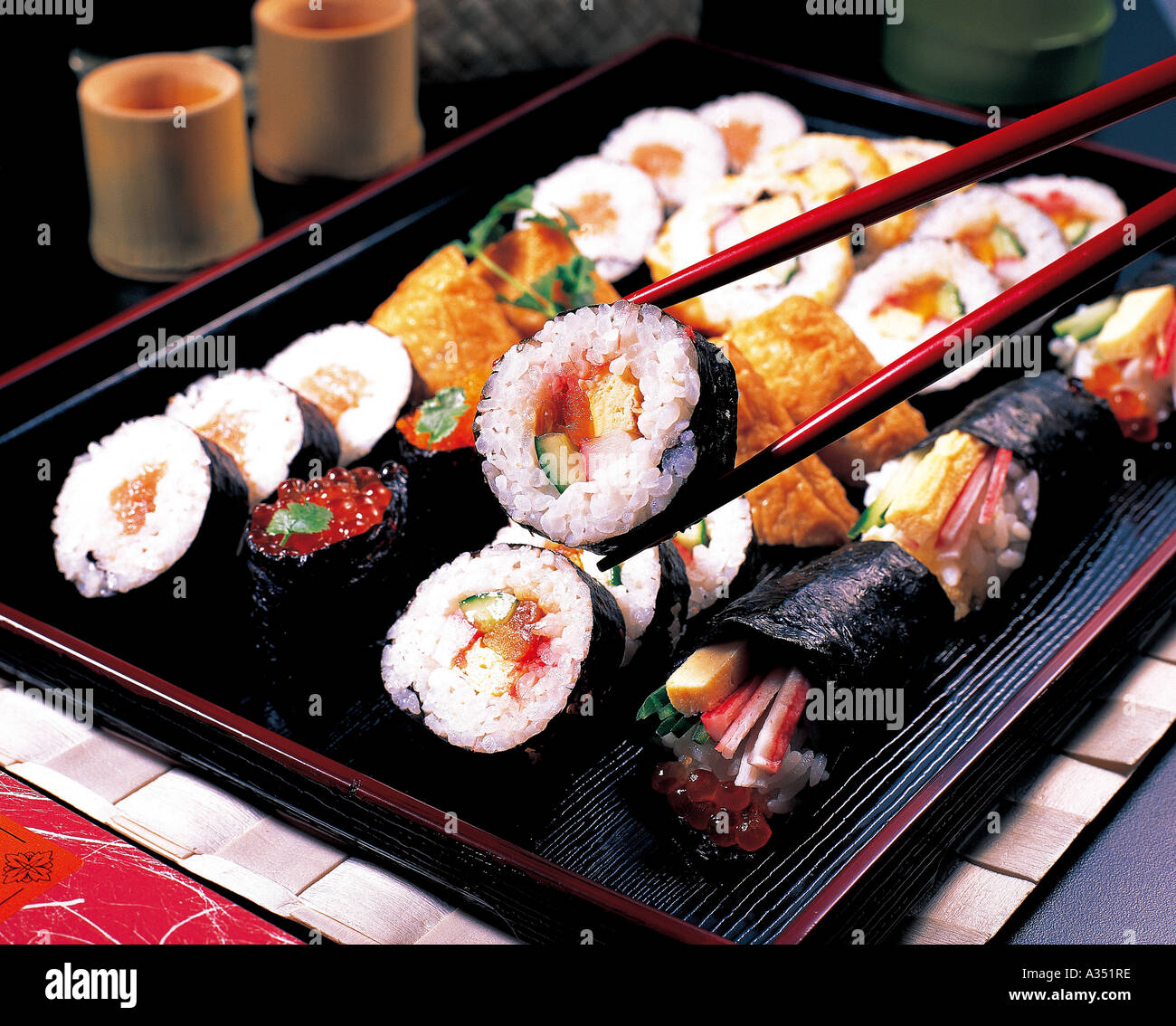 A closed view on a plate of sushi combinations Stock Photo - Alamy