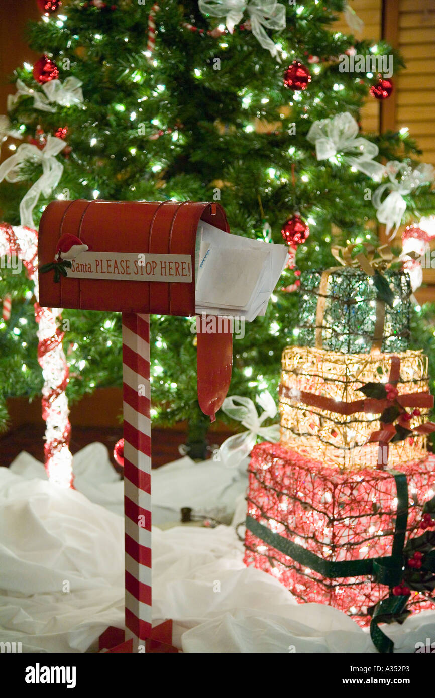 Christmas tree with lighted presents and mail in mailbox Stock Photo ...