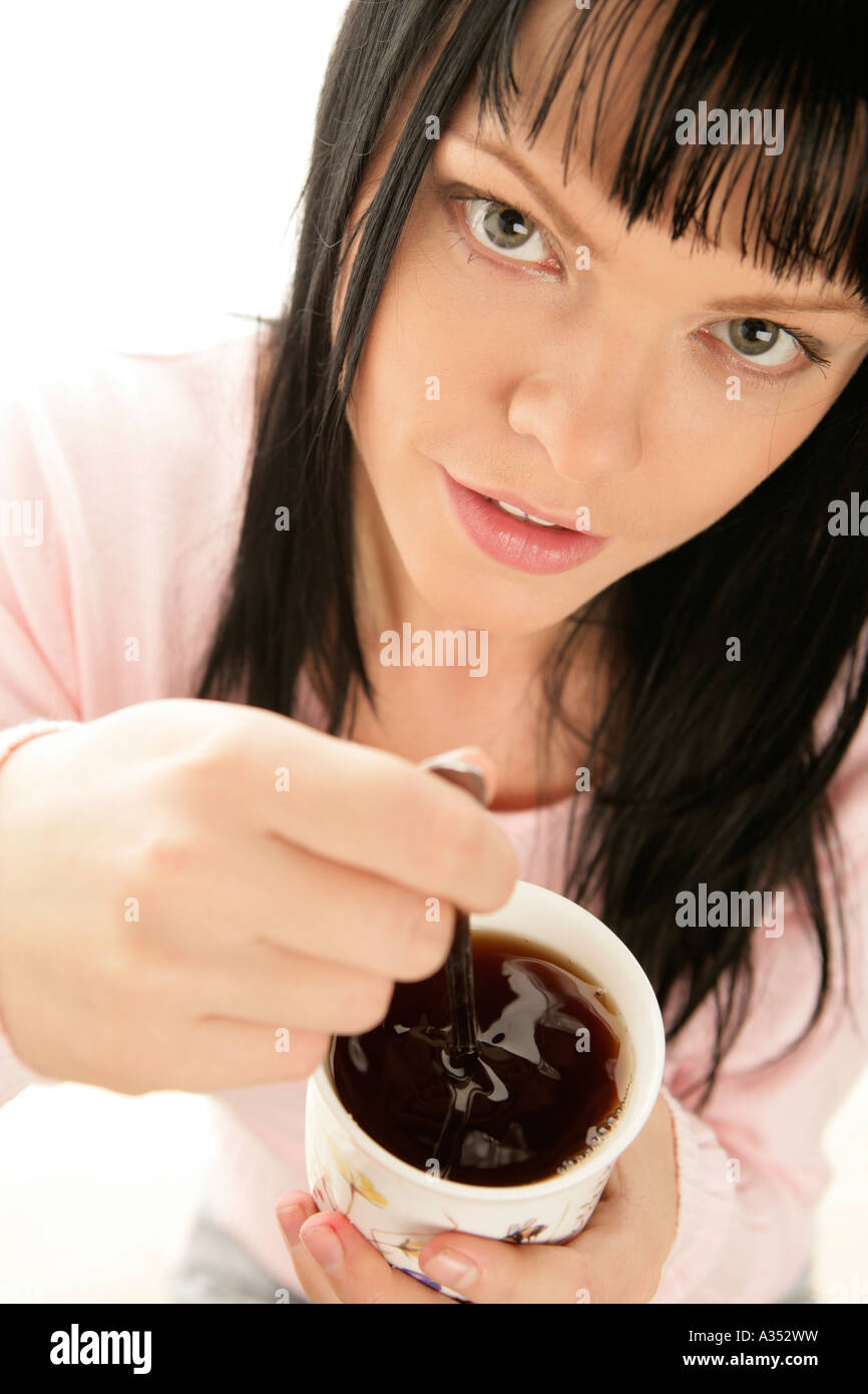 Woman with mug of tea Stock Photo - Alamy
