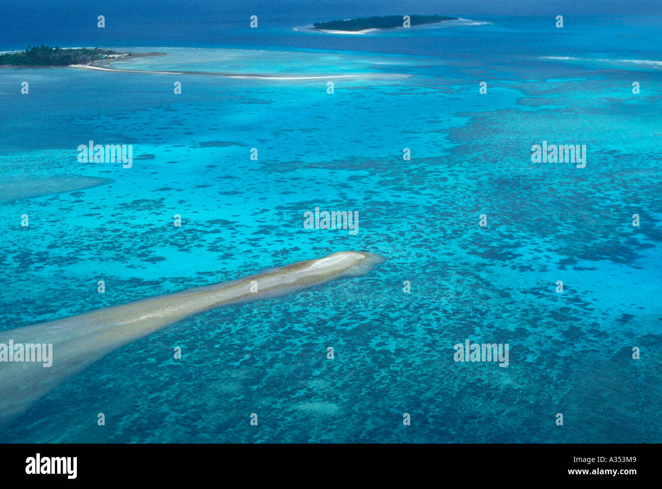 An aerial view with islands growing Diego Garcia Islands in the Indian ...