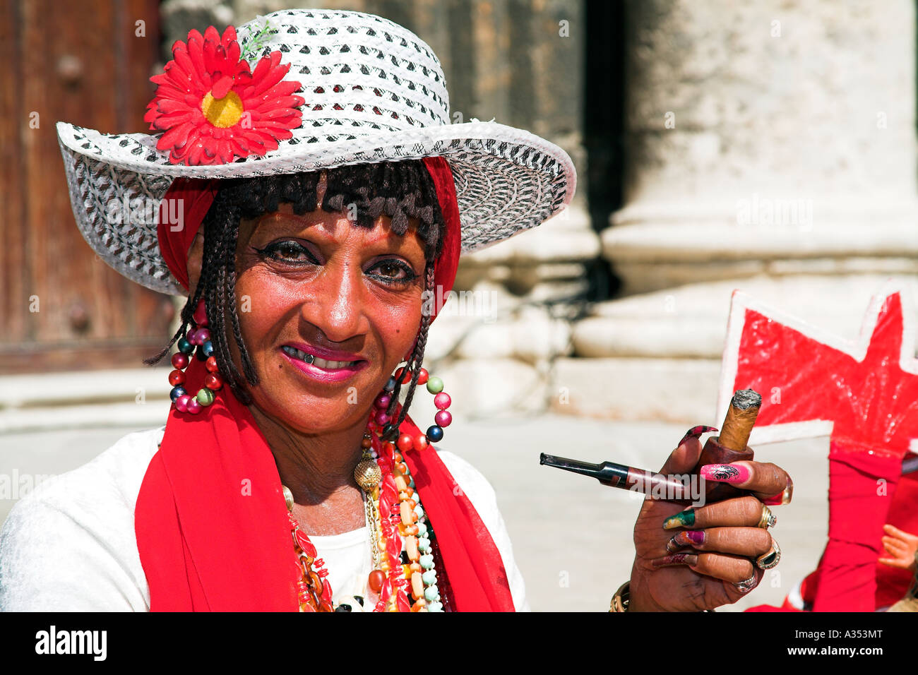 Lady holding a pipe and cigar, sitting on Cathedral steps, Plaza de la ...