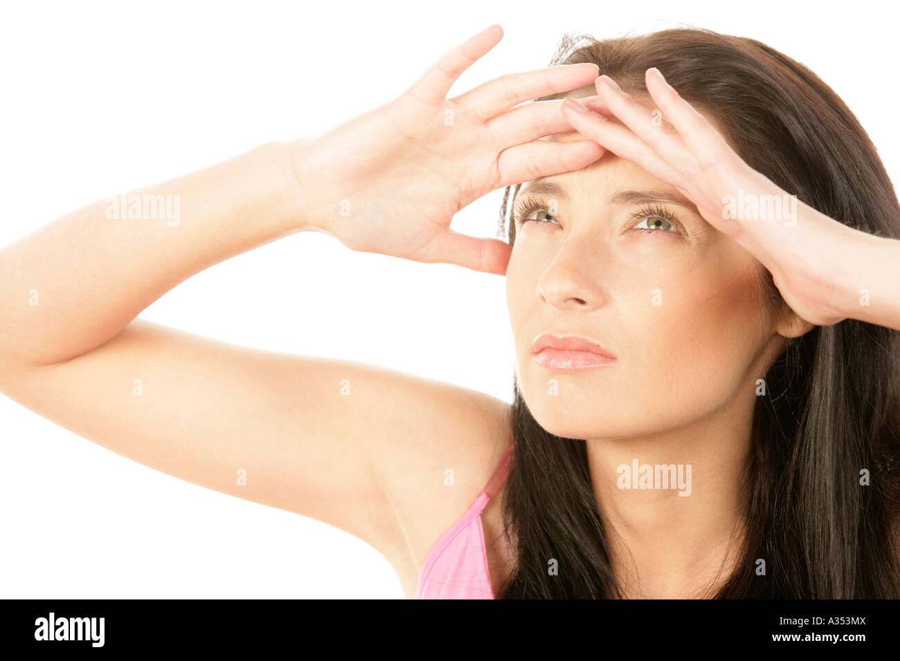 Woman shielding her eyes from light Stock Photo - Alamy