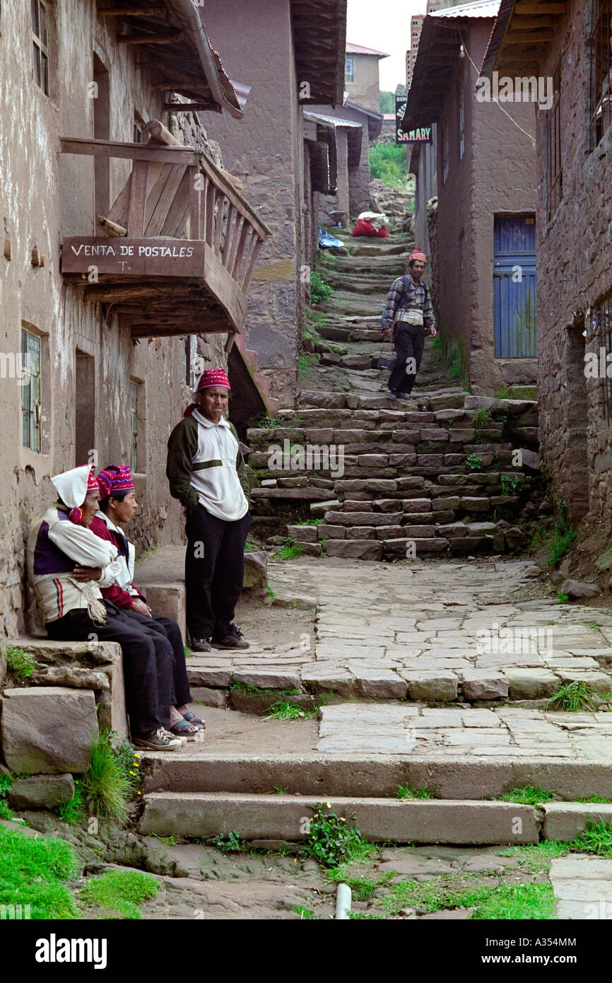 Quechua men in the village on Isla Taquille. Lake Titicaca, Peru, South ...