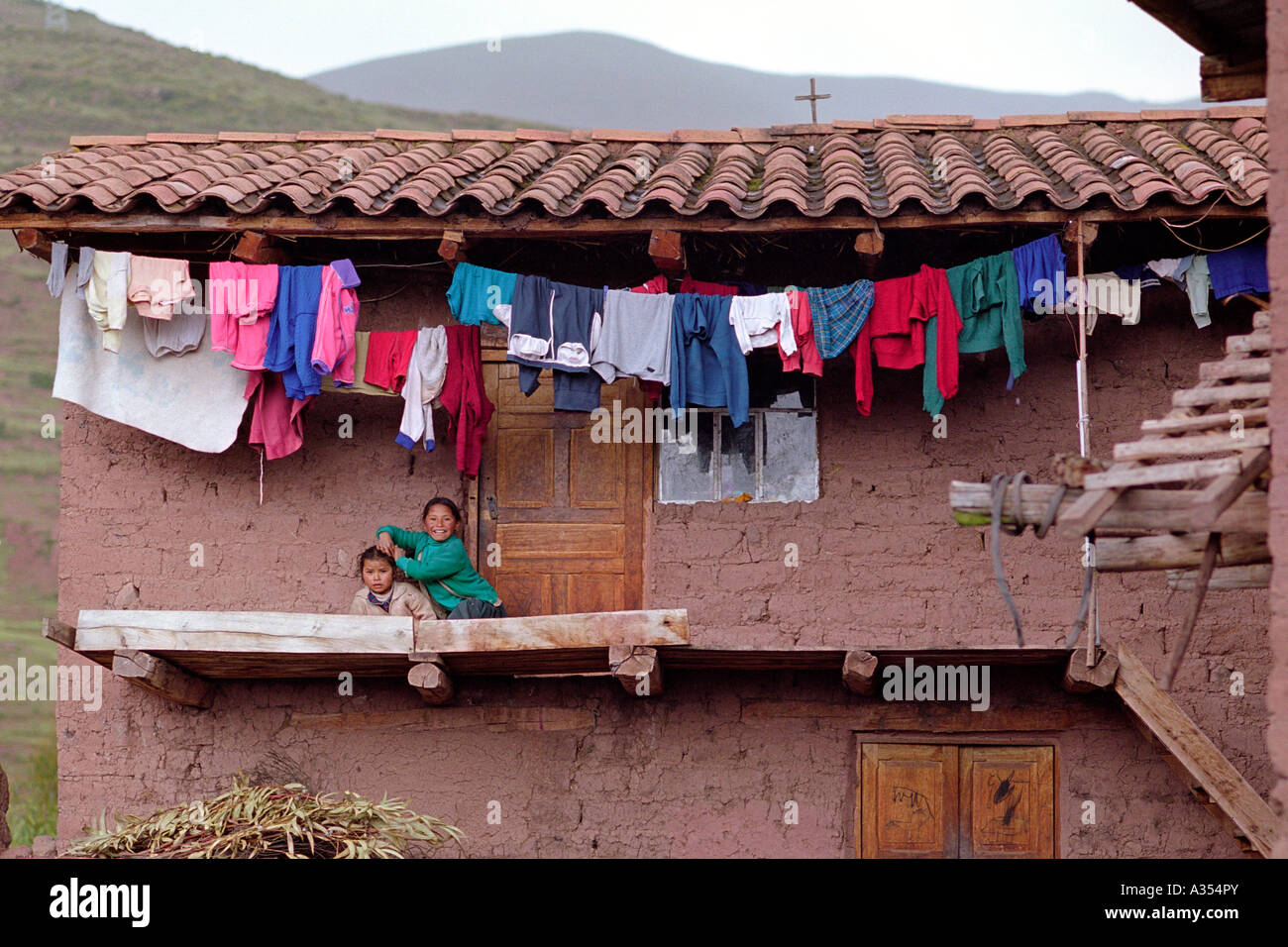 Quechua children at their home in a village near Pisac, Cuzco, Peru ...