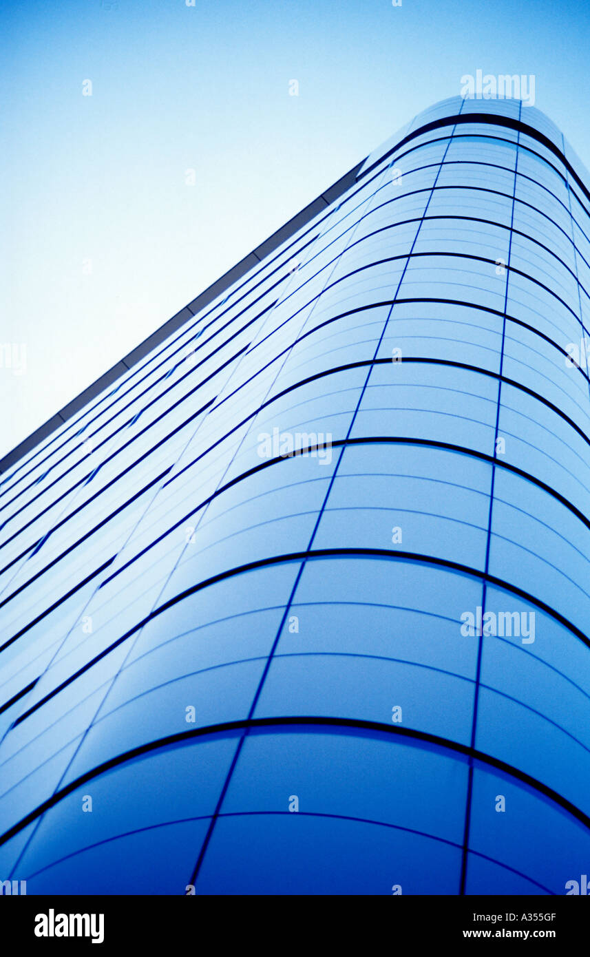 curved blue corporate building in Dubai UAE Stock Photo - Alamy