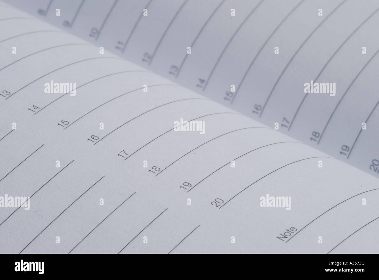 Close up of diary pages showing times Stock Photo - Alamy