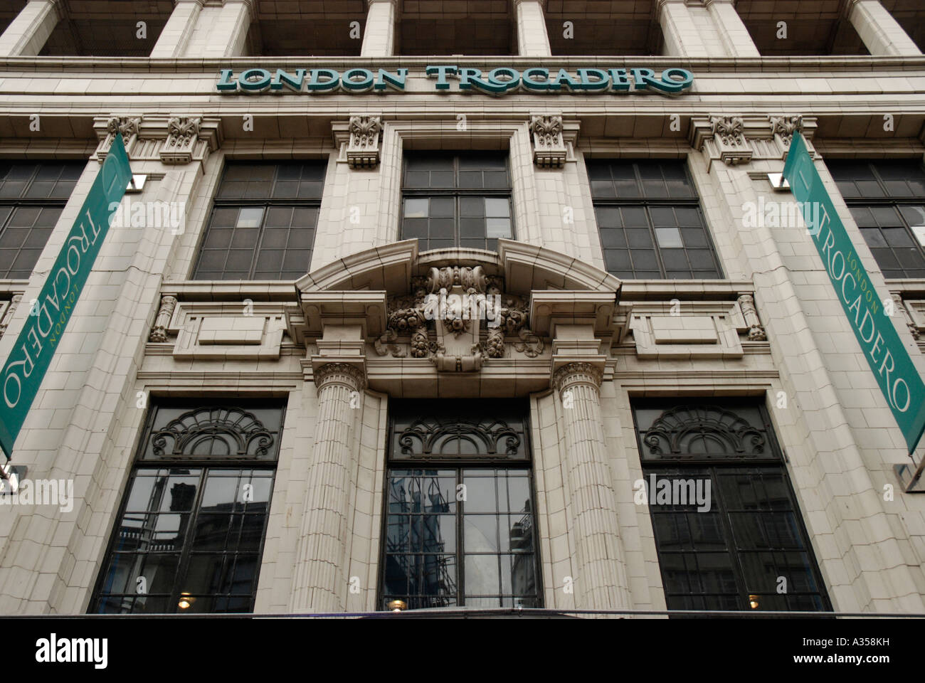 Looking up at London Trocadero building facade Piccadilly Circus London ...