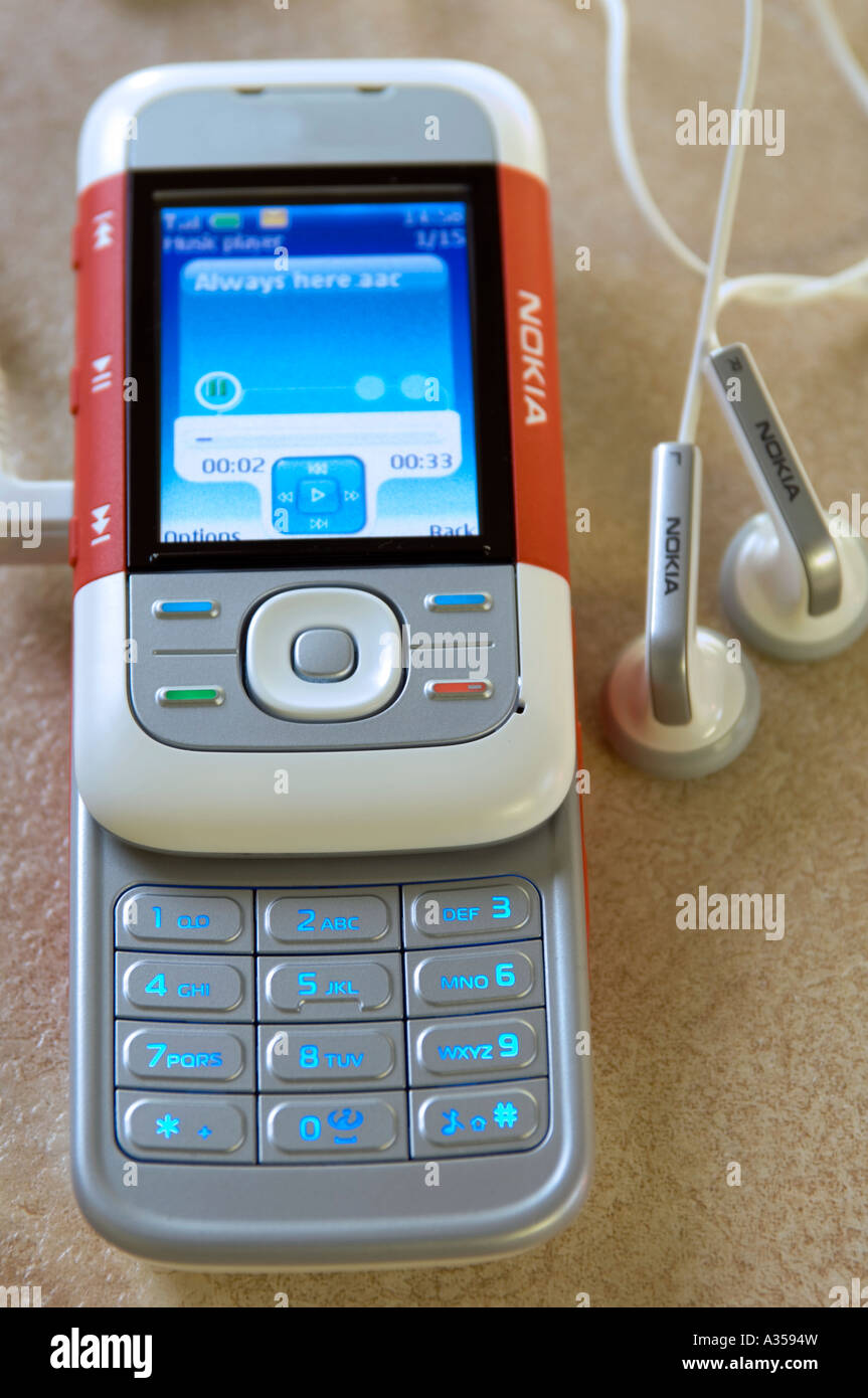 a mobile telephone with a built in mp3 player Stock Photo - Alamy