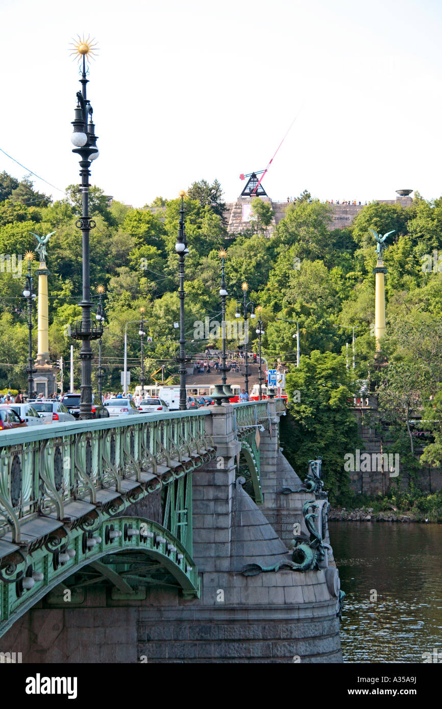 Chechuv bridge over the Vltava river, Prague, with the metronome at ...