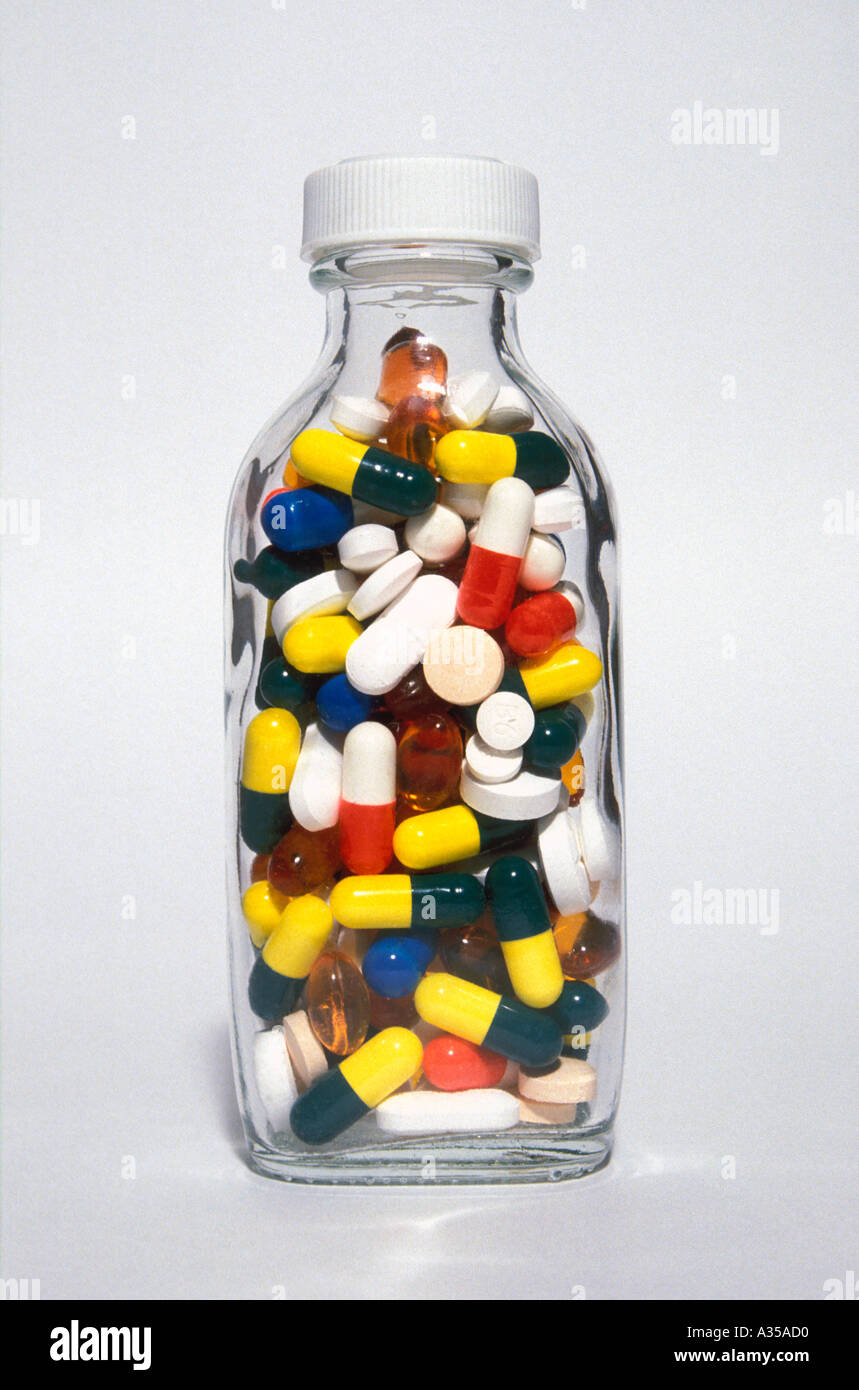 Coloured tablets bottle hi-res stock photography and images - Alamy