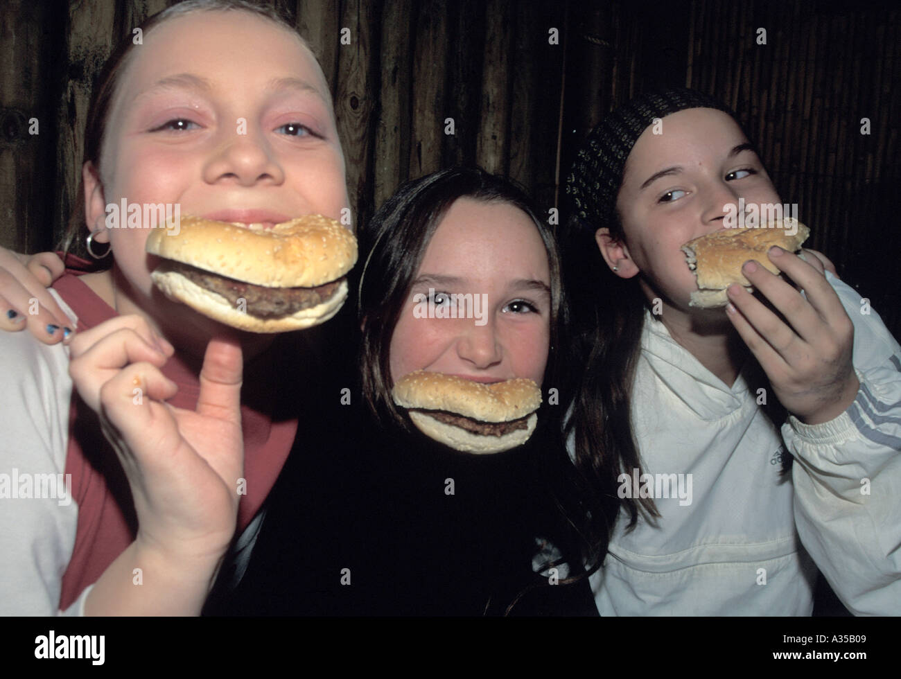 Children at Play While Eating Food Stock Photo - Alamy