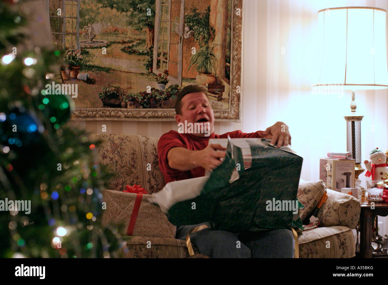 Rip open gifts hi-res stock photography and images - Alamy