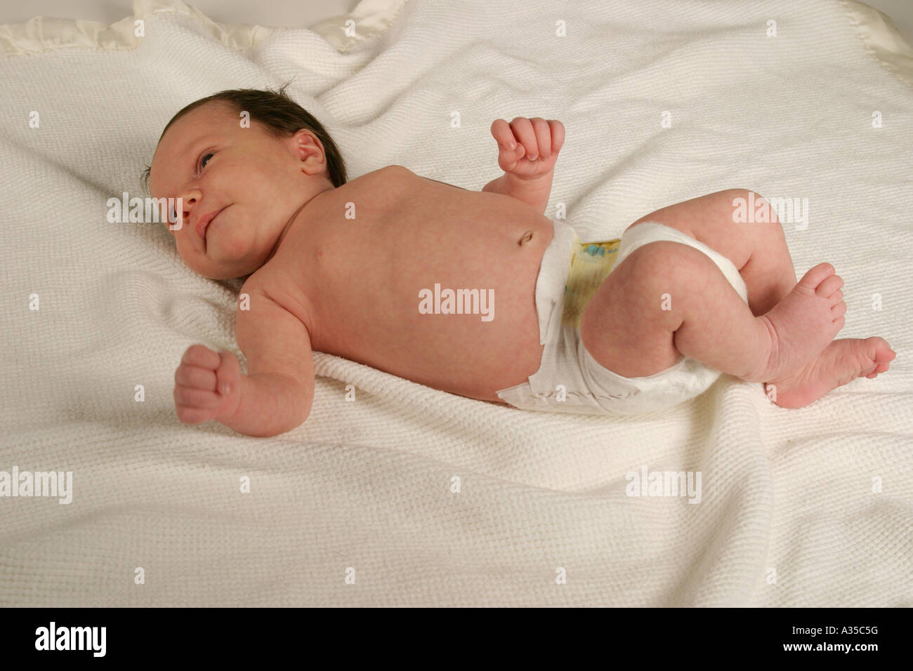 Baby on Back Stock Photo - Alamy