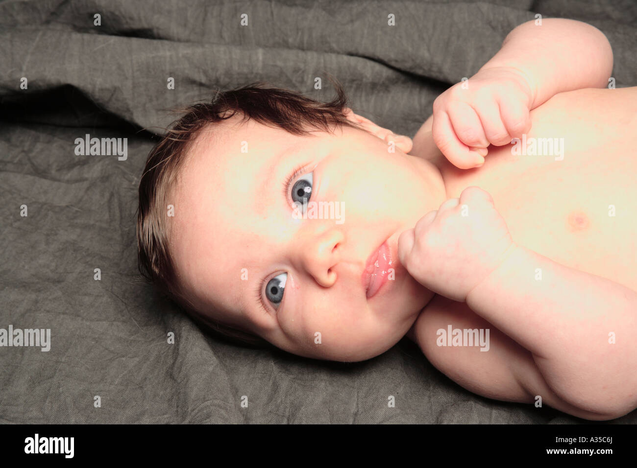 Baby on Back Stock Photo - Alamy