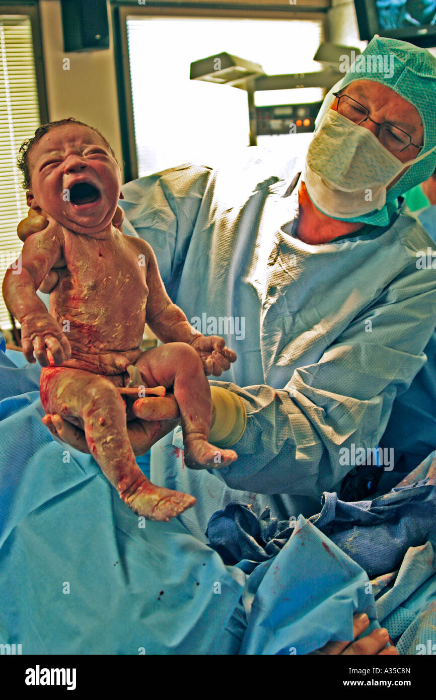 New Born with Doctor Stock Photo - Alamy