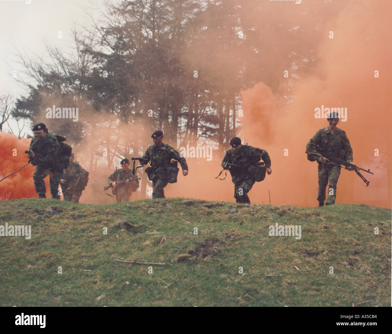 Soldiers attack under Smoke during Training Stock Photo - Alamy