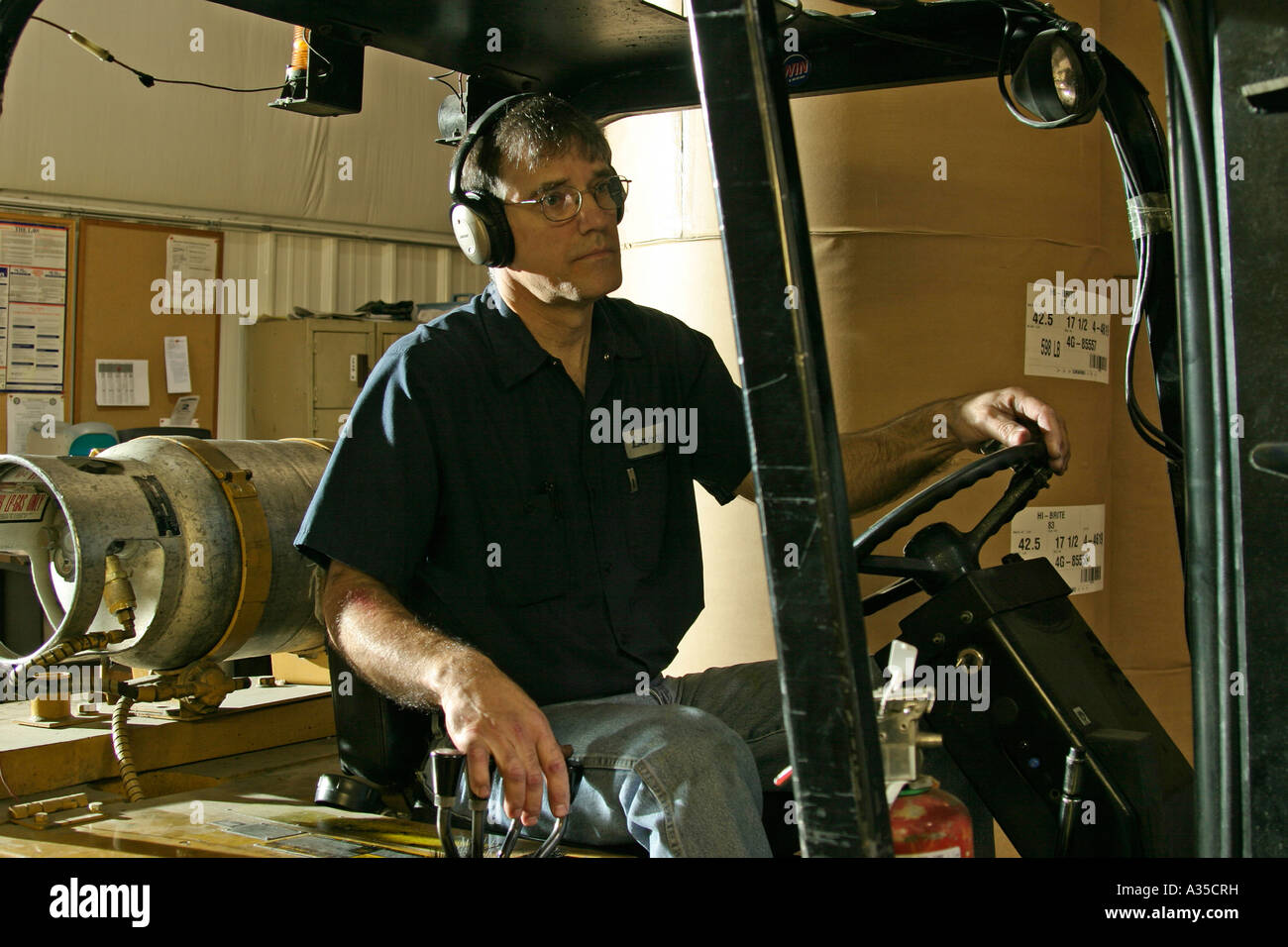 Lift operator hi-res stock photography and images - Alamy