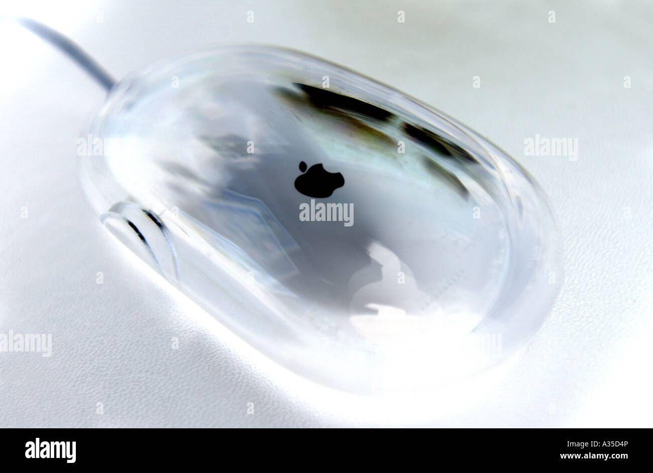 Inverse transparent iMac computer mouse UK Stock Photo - Alamy
