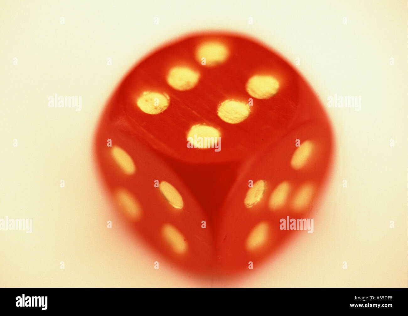 Dices dice a red dice showing six Stock Photo - Alamy