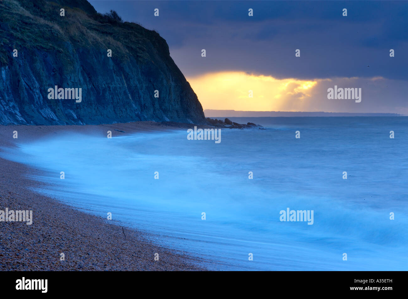 the Jurassic Coast at dawn Eype Point with Portland beyond Dorset ...