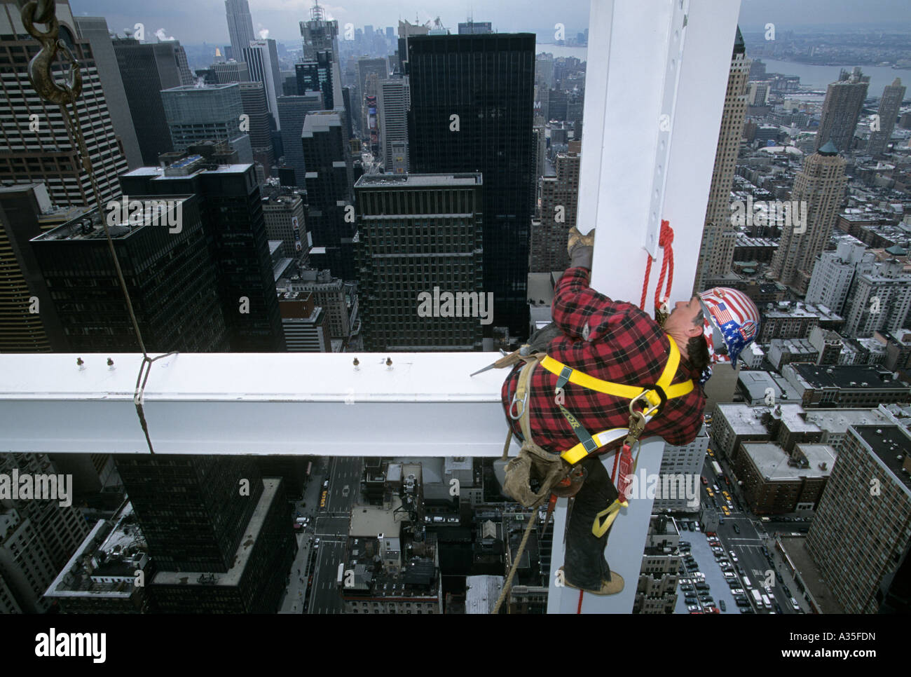 Iron worker connector works 675 feet high on Random House building at ...