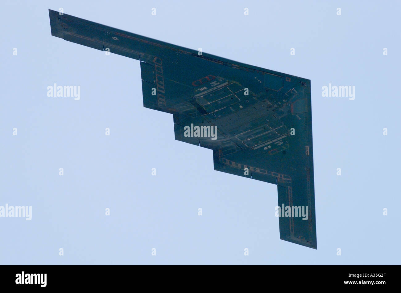 Underside of a United States Air Force B-2 Spirit in a clear, blue sky ...