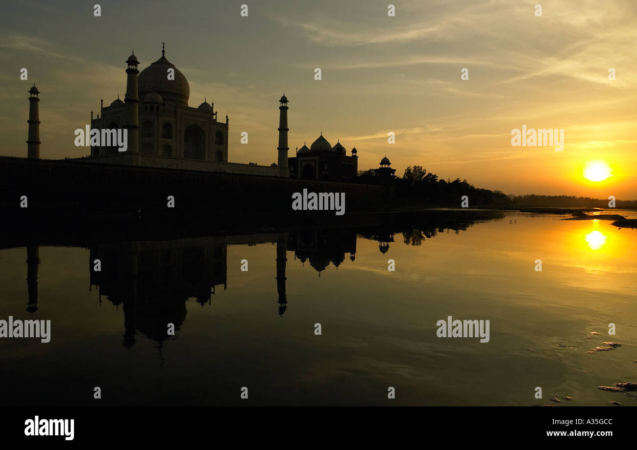 The Taj Mahal viewed at sunset from the banks of the Yamuna River in ...