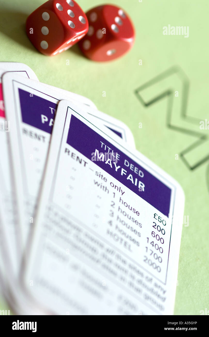 Close up of monopoly board cards and dice business concept Stock Photo ...
