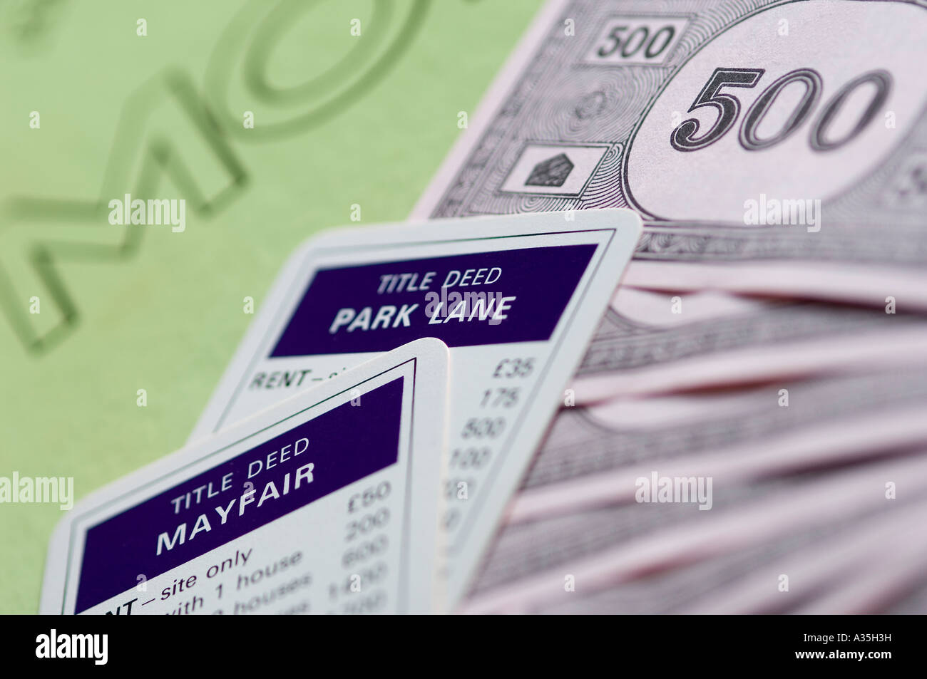 Close up of monopoly money and cards business concept cash note notes ...