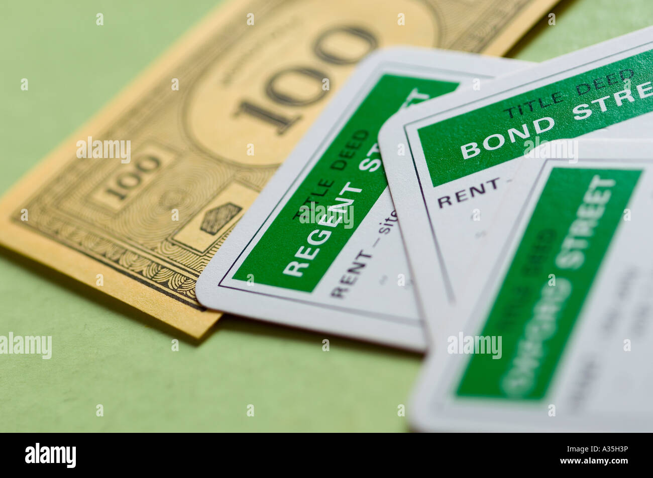 Close up of monopoly money and cards business concept cash note notes ...