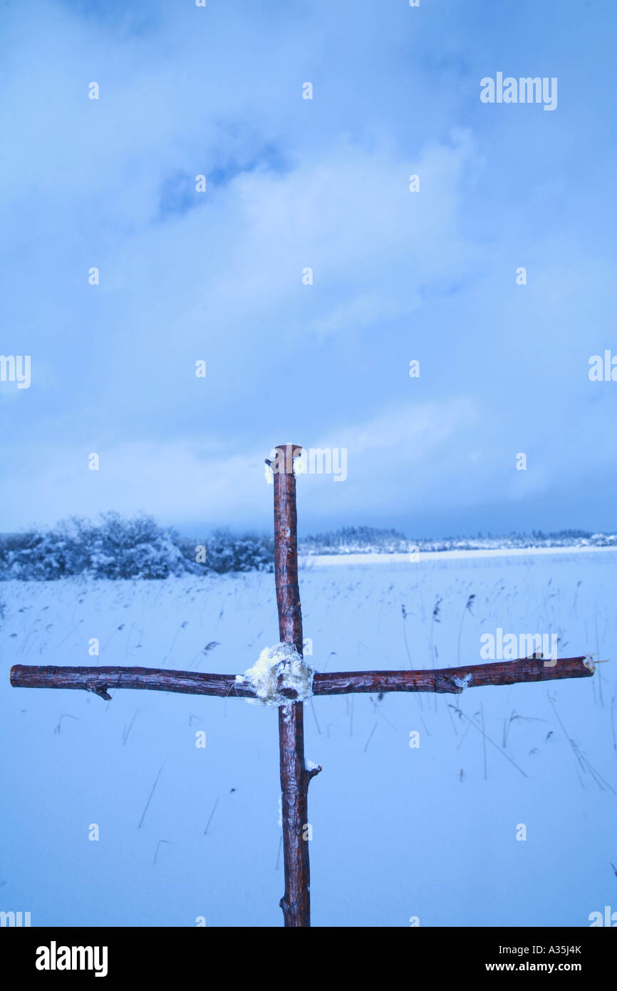 Cross in winterscene Stock Photo - Alamy