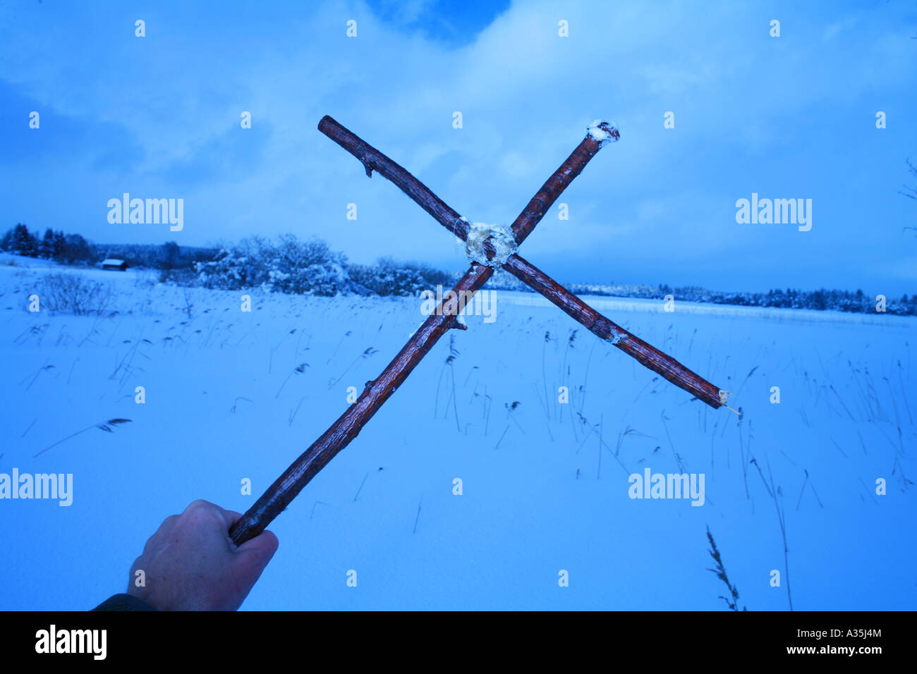 Cross in winterscene Stock Photo - Alamy