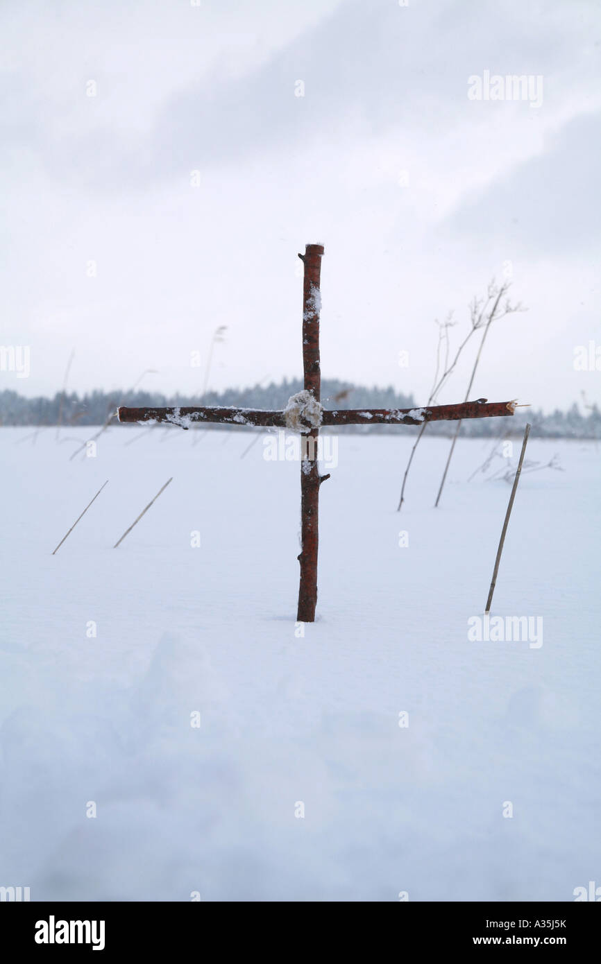 Cross in winterscene Stock Photo - Alamy