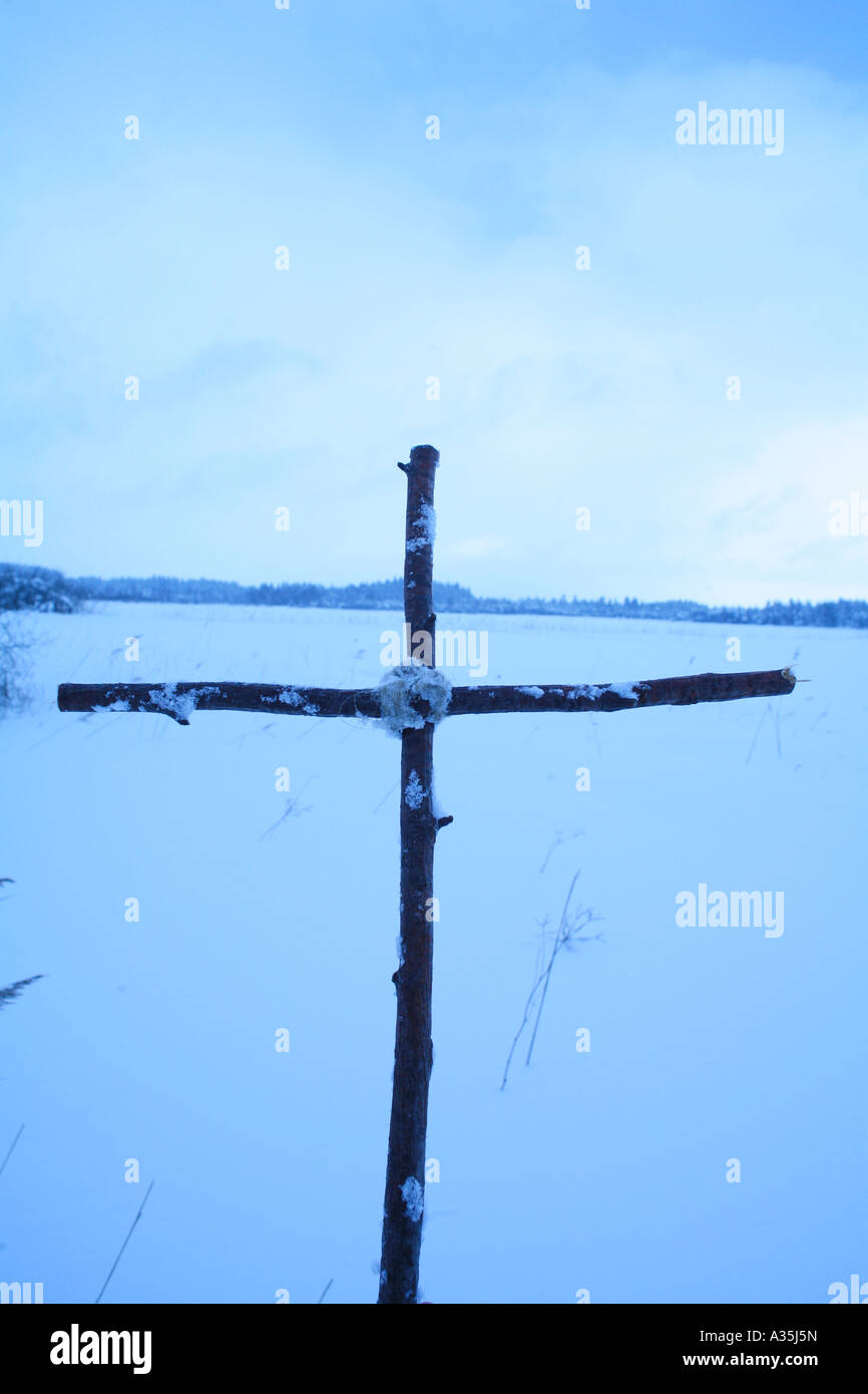 Cross in winterscene Stock Photo - Alamy