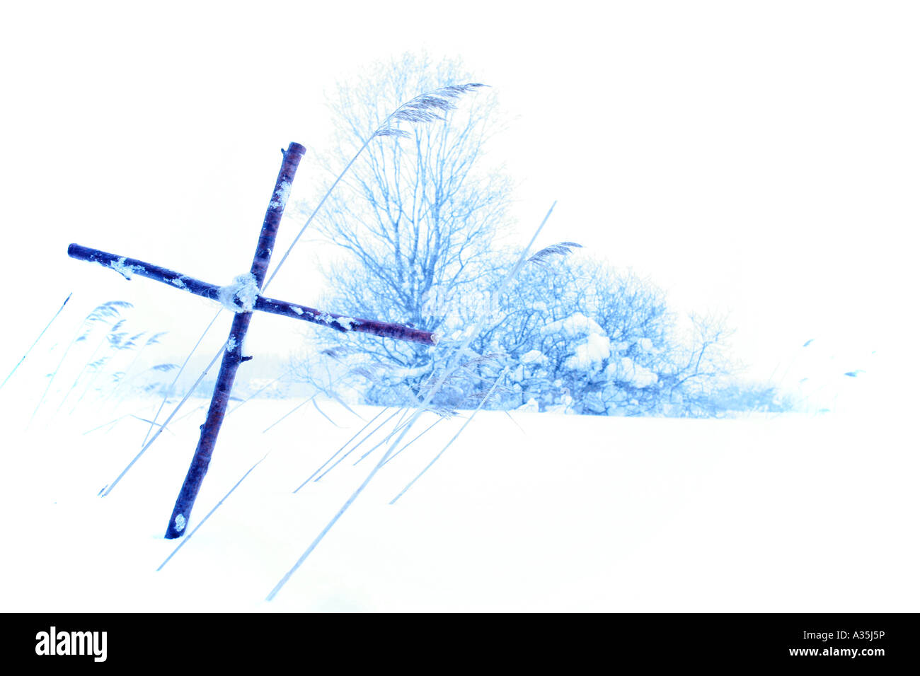Cross in winterscene Stock Photo - Alamy